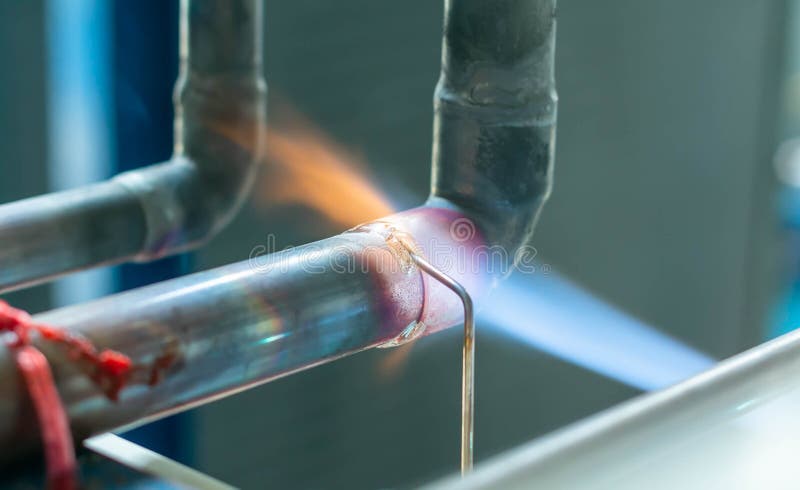 Welding of Copper Pipe of a Methane Gas Pipeline or of a Conditioning ...