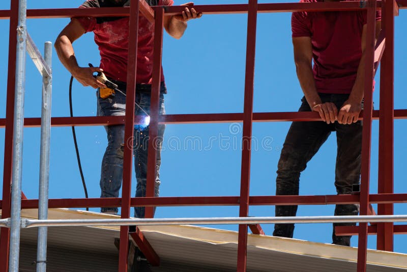 Welding Craftsmen in Steel Construction Manufacturing Stock Image ...
