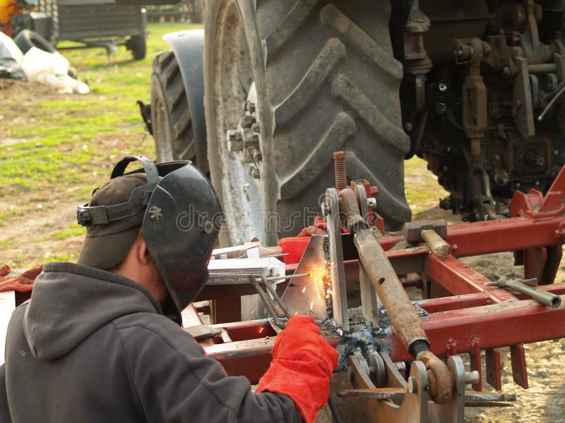 Welding with electrodes stock photo. Image of welder - 145501902