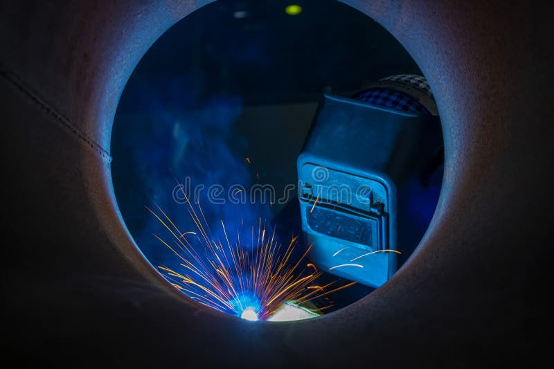 Welding Inside the Pipe. Semi-automatic Arc Welding, MIG Welding Stock ...