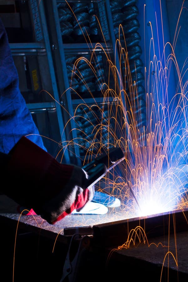 Welder Welding Metal in Workshop with Sparks Stock Image - Image of ...