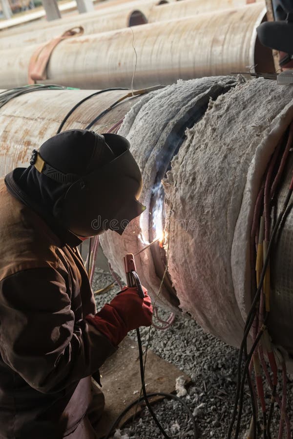 Welding on Large Diameter Pipeline with Use of Crane Stock Photo ...