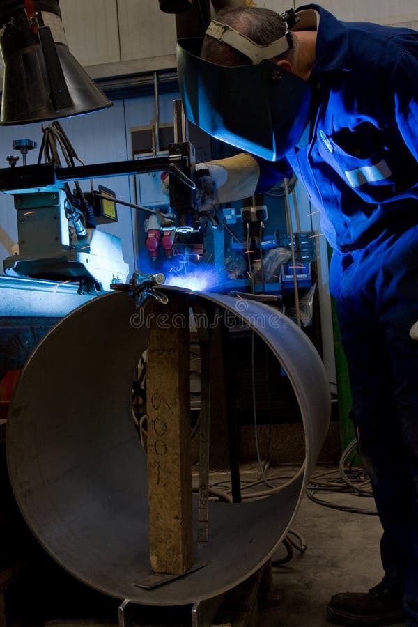 Welding machine operator stock image. Image of fabricate - 9928625