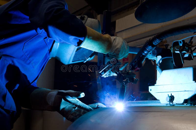 Welding machine operator stock photo. Image of fabrication - 9929164