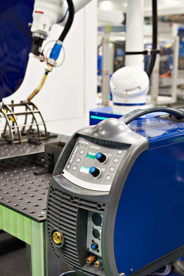 Welding Machine and Robotic Arm Stock Image - Image of manufacture ...