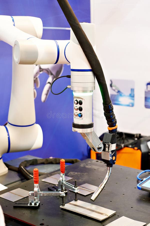 Welding Machine and Robotic Arm Stock Photo - Image of mechanical ...