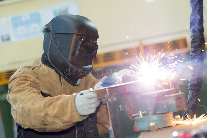 Welding Man Welding Pipe in Industry Stock Image - Image of technical ...