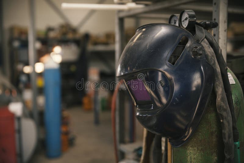 Welding mask in workshop stock image. Image of production - 89597579
