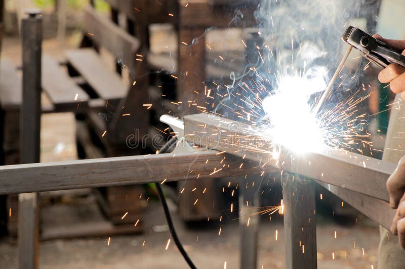 Welding Metal Parts with Sparks and Smoke - Welder S Work Process ...