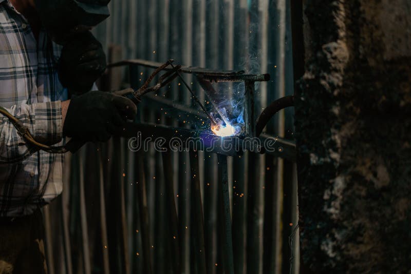 Welding Metal Structures at a Construction Site, Welding a Metal Frame ...