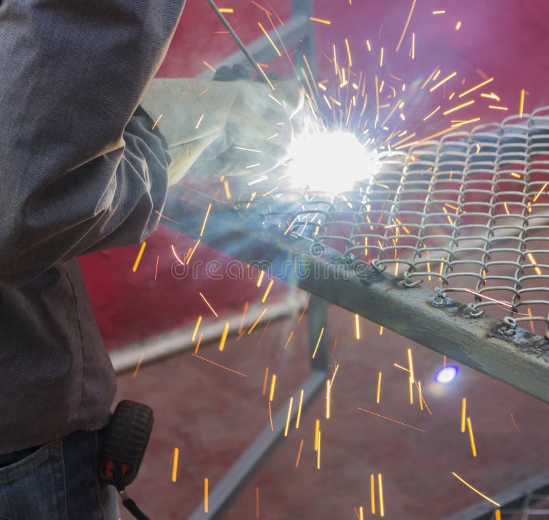 Welding a Net Table with Flash Light Stock Photo - Image of safety ...