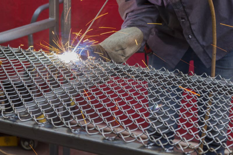 Welding a Net Table with Flash Light Stock Photo - Image of mask ...