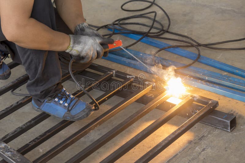 The Welding Operator Welding the Tube Stock Photo - Image of light ...