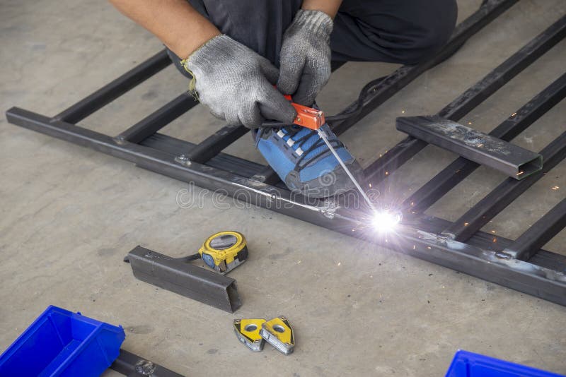 The Welding Operator Welding the Tube Stock Photo - Image of labor ...
