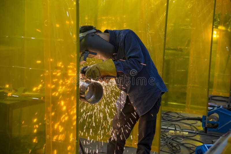 The Welding Operator Use Hand Disk Wheel Grinding Stock Image - Image ...