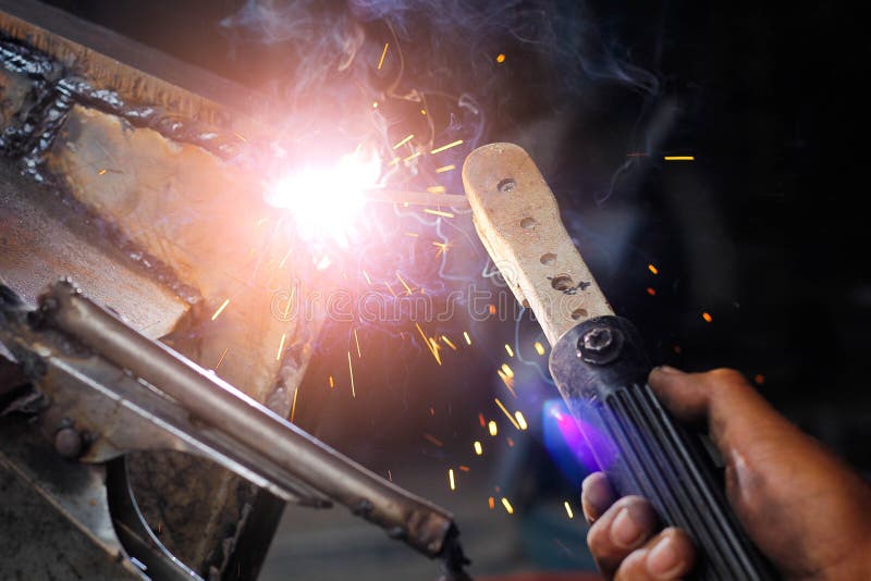 Welding pieces of metal. stock photo. Image of line, equipment - 91547452