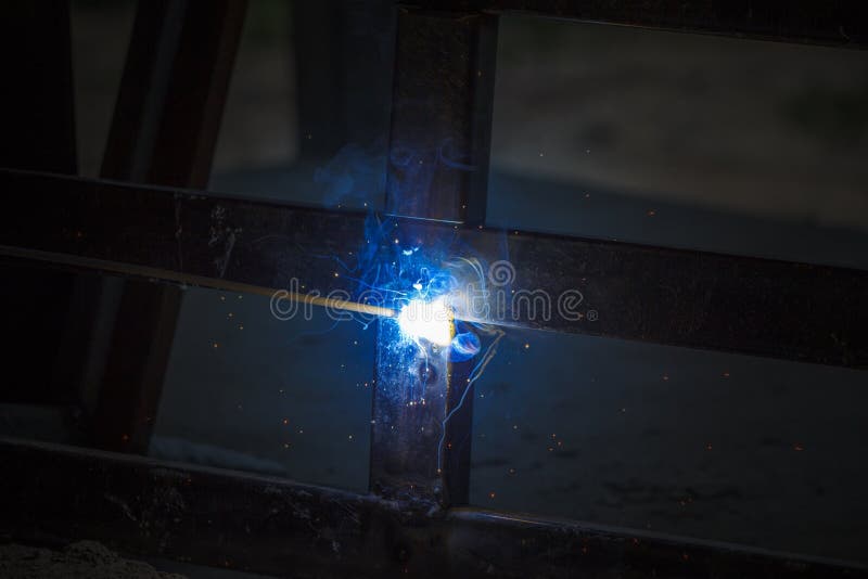 Welding Process with Black Block Metal and Bright Sparks in Steel Iron ...