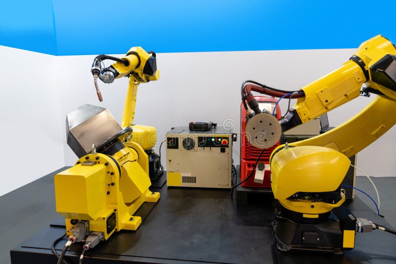 Welding Robot Arms on a Smart Factory Stock Image - Image of industry ...
