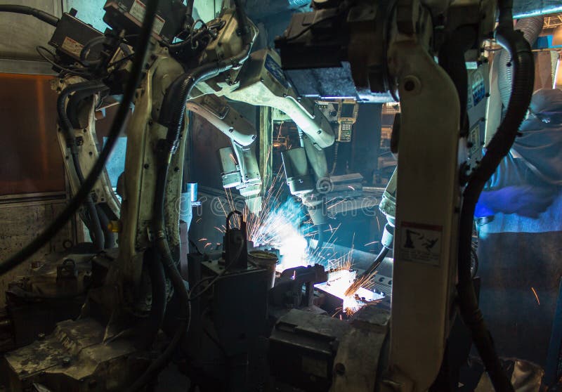 Welding robots movement stock image. Image of high, industry - 58535771