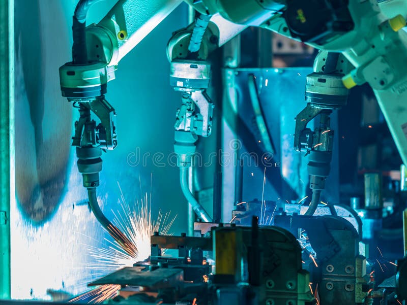 Welding Robots Movement in a Car Factory Stock Photo - Image of factory ...