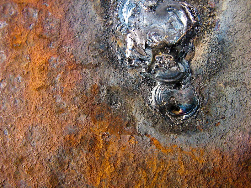 Welding on a Rusty Piece of Metal Stock Photo - Image of construction ...