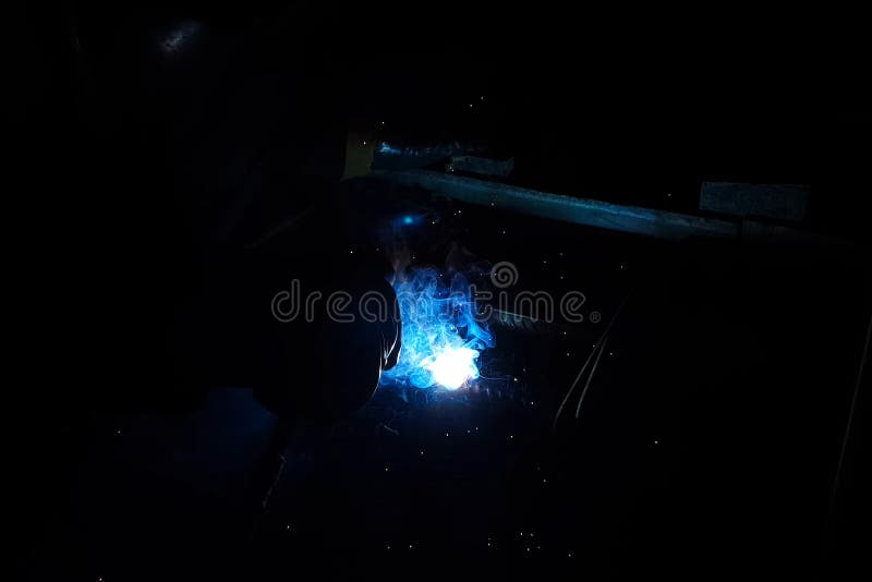 Welding of Steel Reinforcement. Sparks and Light from Stock Image ...