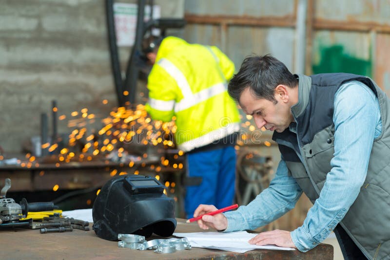 Welding Supervisor Checking Design Stock Photo - Image of steelwork ...