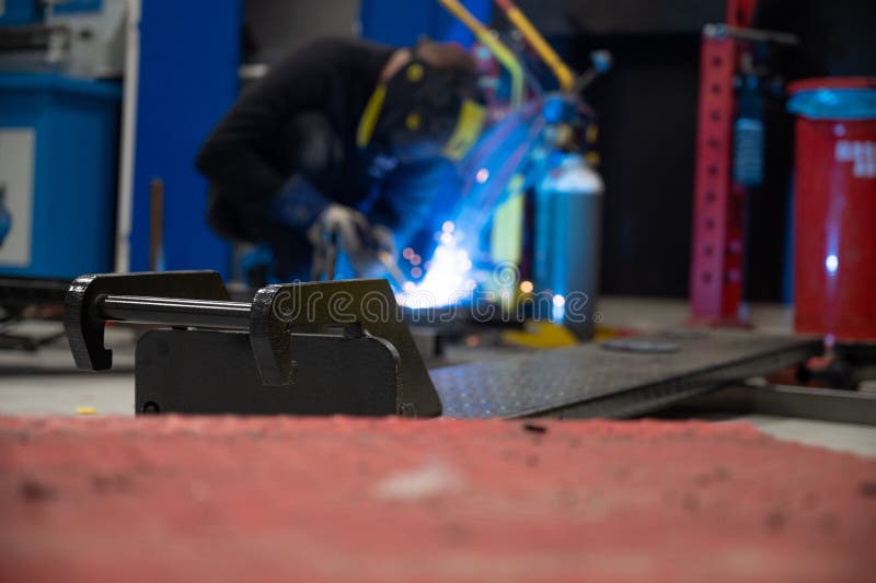 Welding together metal stock image. Image of smoke, production - 205622129