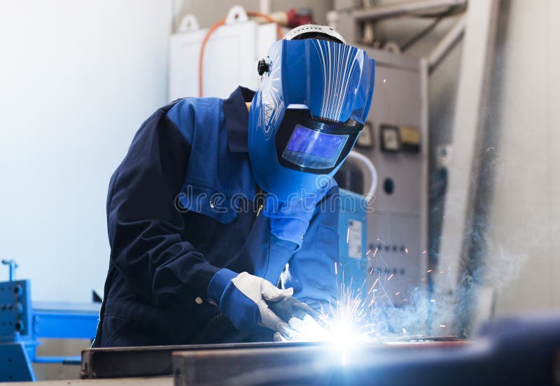 Welding a Car Part in Factory Stock Image - Image of fumes, blue: 5289675