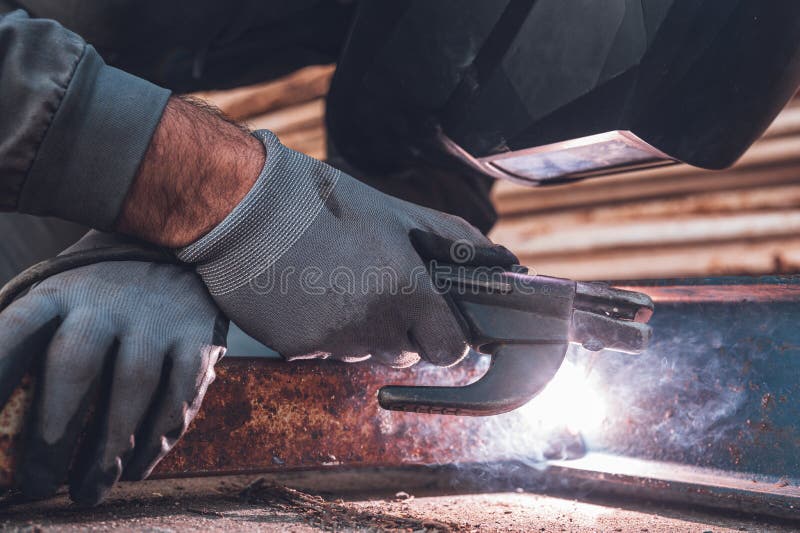 Welding Work, Man Welding in Workshop. Metalwork and Sparks ...