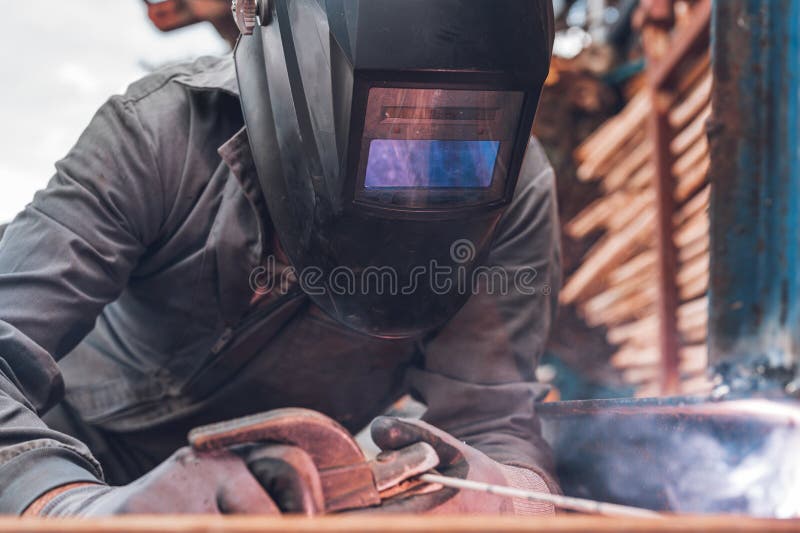 Welding Work, Man Welding in Workshop. Metalwork and Sparks ...