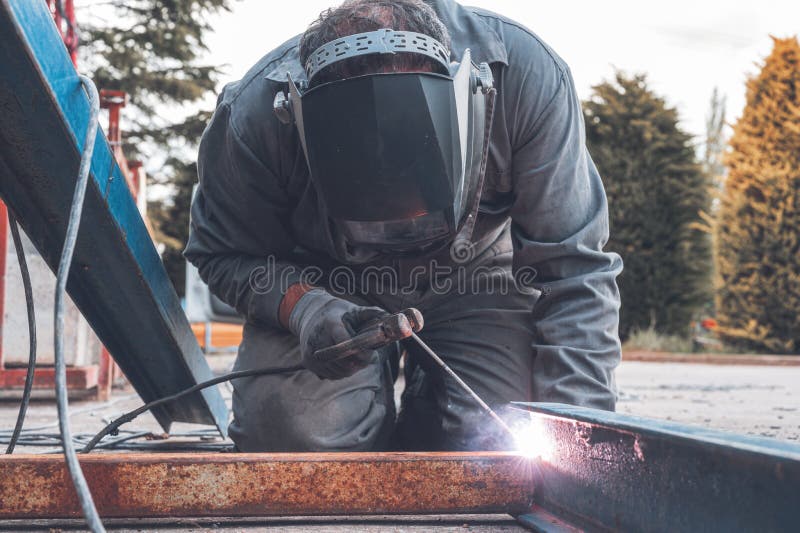 Welding Work, Man Welding in Workshop. Metalwork and Sparks ...