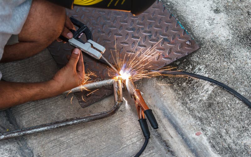 Welding Worker close-up stock photo. Image of skill, closeup - 76574158