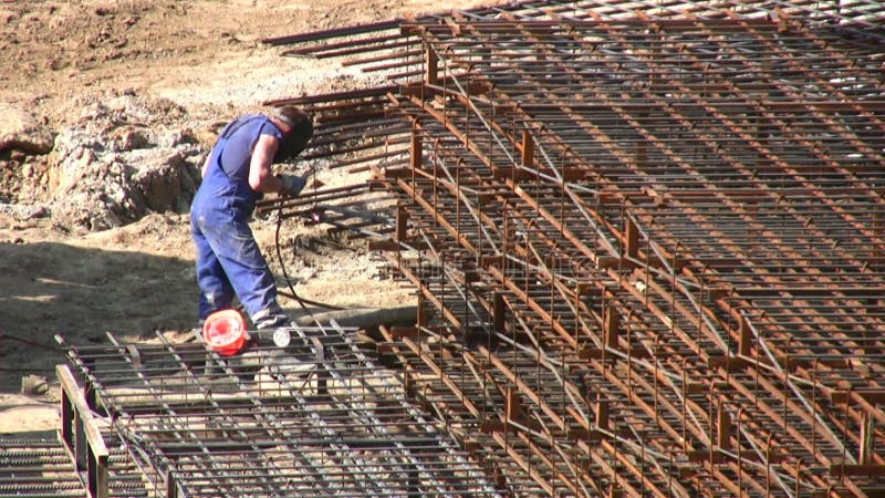 Weldor A Man With A Welding Machine Welds Metal Stock Video Video Of