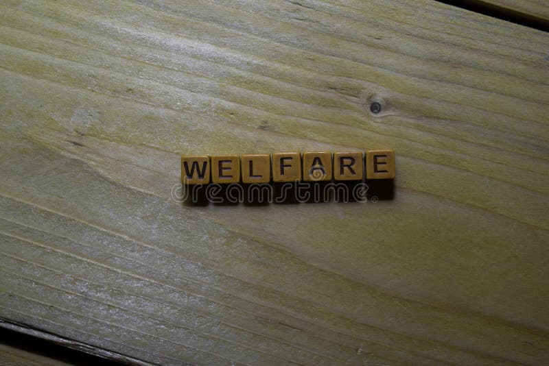 Welfare Word on Wooden Blocks Isolated on Wooden Table Stock Image ...