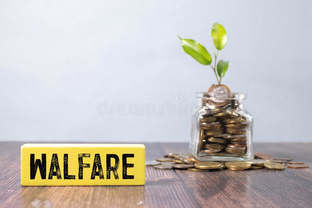 Welfare Word Written on Cube Shape Wooden Blocks on Wooden Table Stock ...