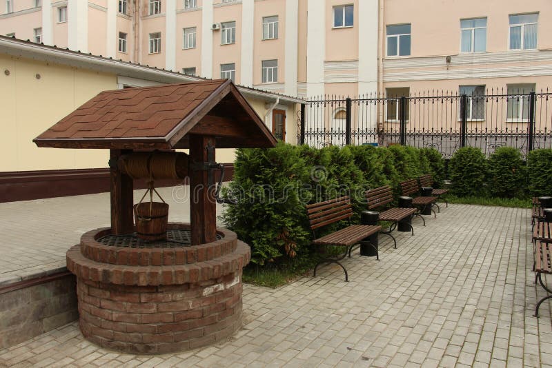 Well with a bucket stock image. Image of blue, deep - 111805947