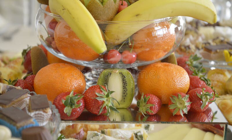 Well Decorated Fruits on a Table Stock Image - Image of fruits, cakes ...