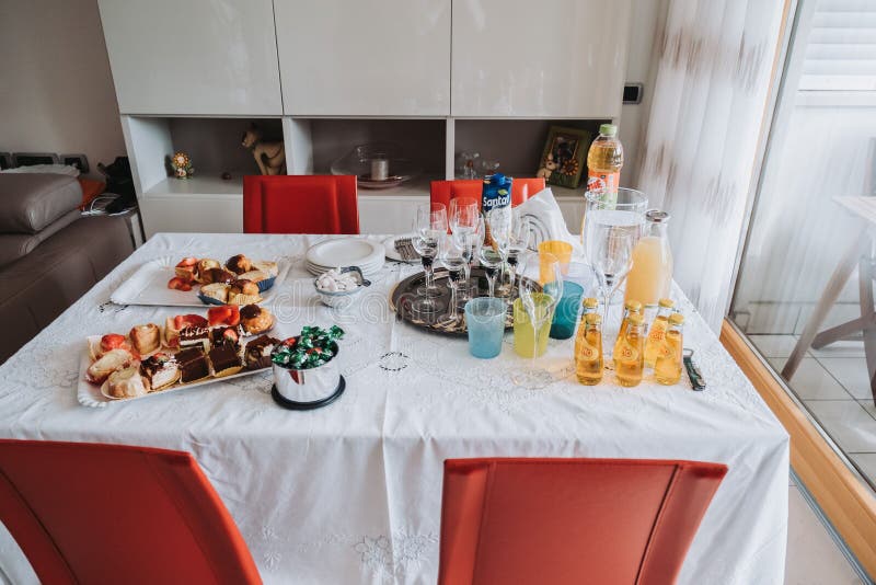 Well-designed Table in Bolzano Full of Sweets and Drinks Editorial ...