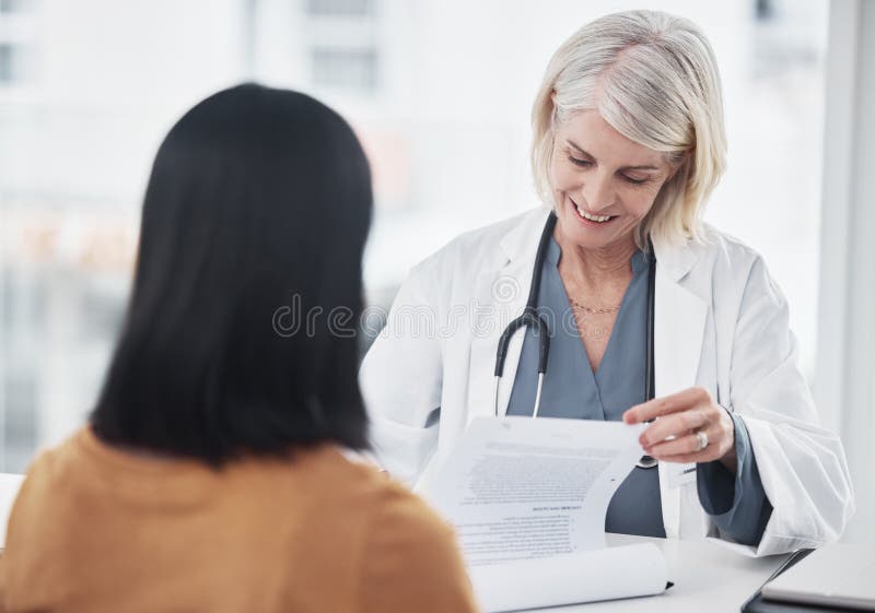 Well Done on Keeping Up with Your Routine Checkups. a Doctor Having a ...
