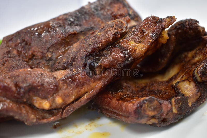 Well-Done Ribs Plated on a White Background Stock Image - Image of ...