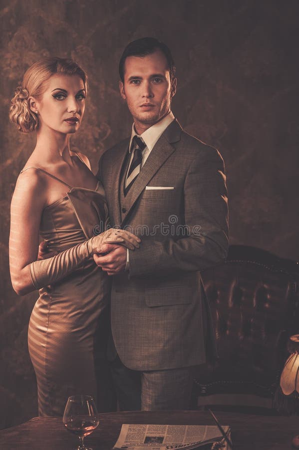 Well-dressed Retro Style Couple Stock Photo - Image of confident ...