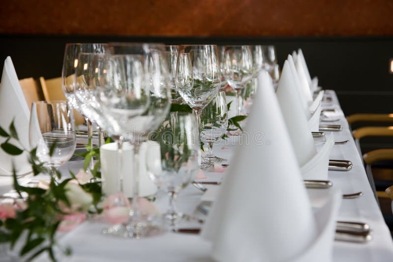Well-laid Table with Plates and Glasses in a Grey Dining Room Interior ...
