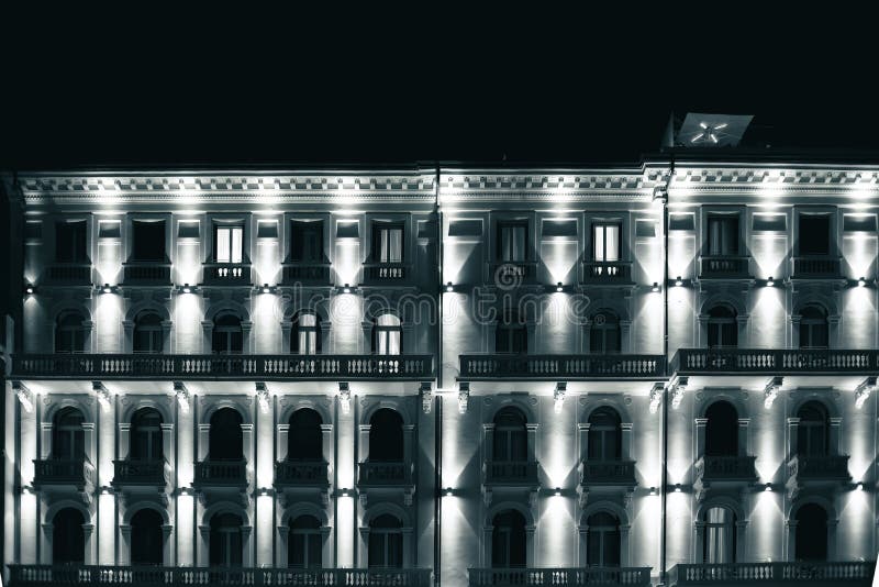 Well Lit Building Facade at Night Stock Image - Image of evening ...