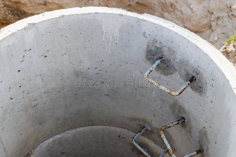 A Well Made of Reinforced Concrete Rings with Water at the Bottom ...