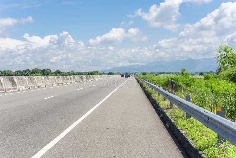 A Well Maintained Stretch of Divided Highway with a Concrete Divider or ...