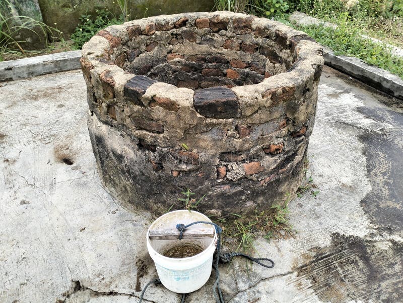 Ancient well stock image. Image of grave, flower, balance - 267532683