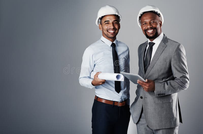 Well Turn Your Plans into a Reality. Two Civil Engineers Discussing ...