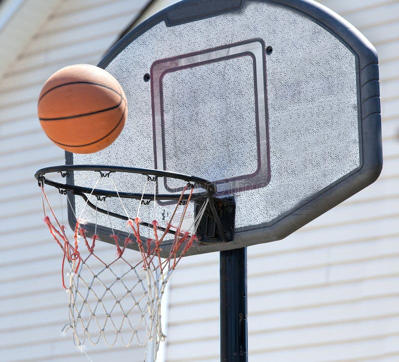 Well-Used Backyard Backetball Hoop and Ball Stock Photo - Image of ...