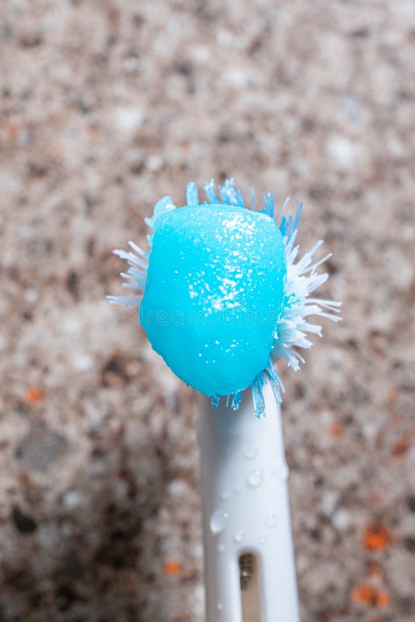 Well Used Electric Toothbrush with Blue Toothpaste Stock Image - Image ...